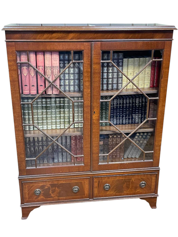 Mahogany bookcase having two astragal glazed doors above two drawers, 122cm by 94cm by 28.5cm ...