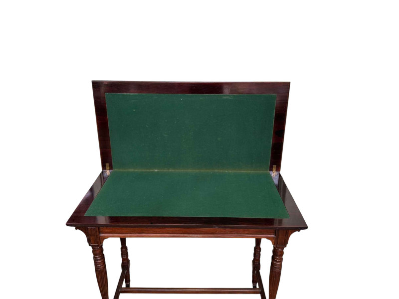 Late Victorian walnut fold top card table on turned reeded legs with ...