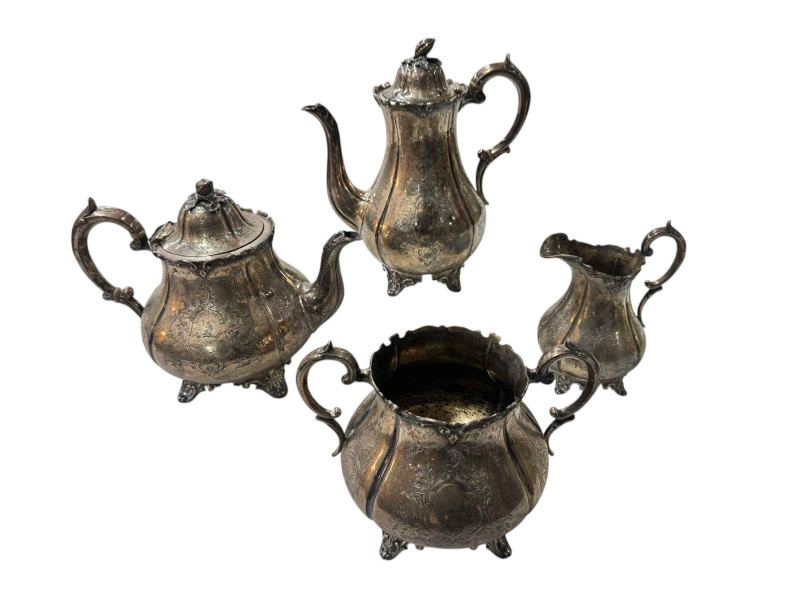 Victorian silver four piece tea and coffee set, the ribbed bodies with ...