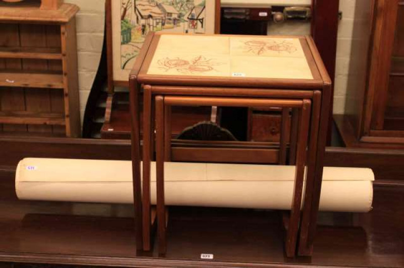 Teak and tiled nest of three tables and two unframed maps | Thomas Watson